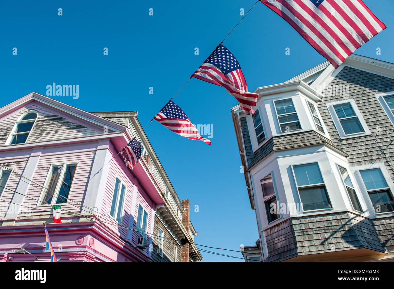 Iconic Commercial Street in Provincetown. Cape Cod is a popular travel ...
