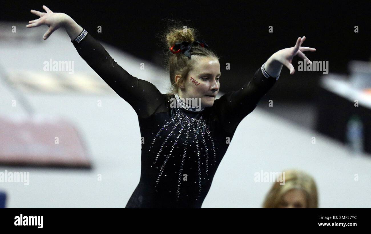 TWU's Paige Stuyniski performs on the balance beam at an NCAA Women's ...