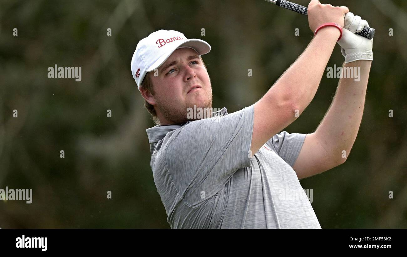 Canon Claycomb, of Alabama, watches his tee shot on the eighth hole ...