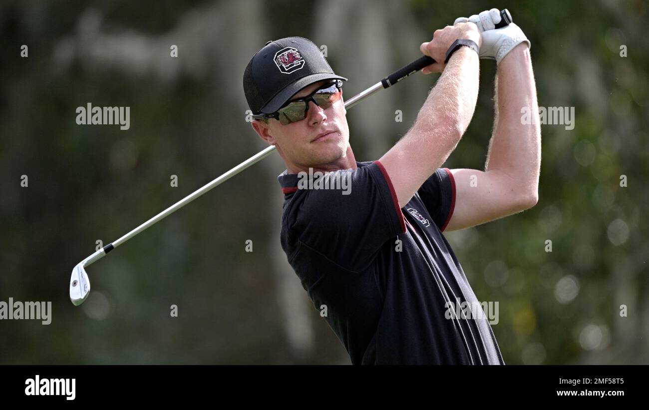 Ryan Hall, of South Carolina, watches his tee shot on the eighth hole ...