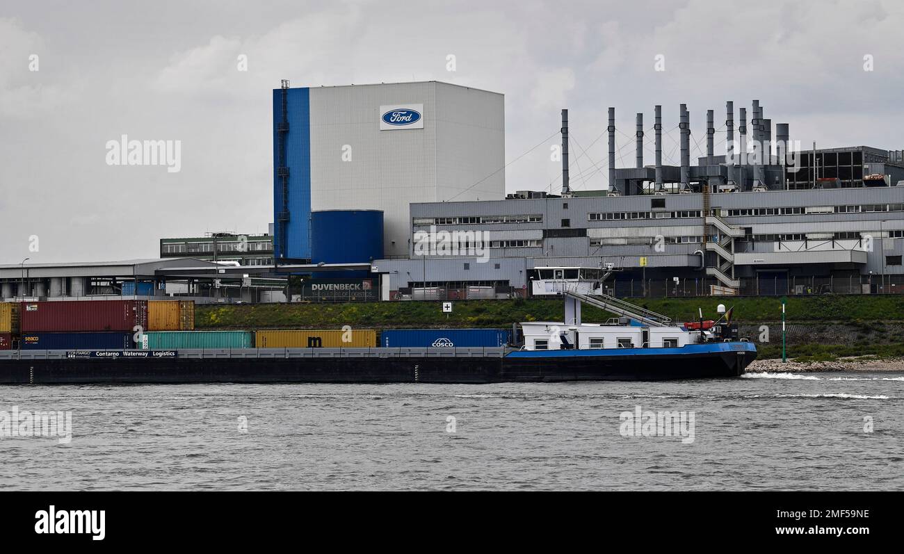 FILE - In this May 4, 2020 file photo, a container ship passes the Ford ...