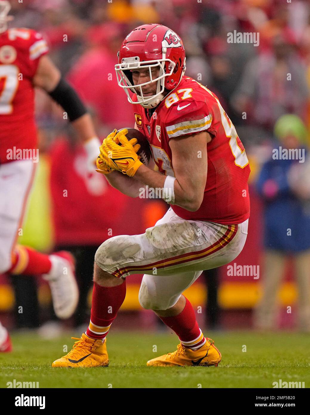 Kansas City Chiefs tight end Travis Kelce runs the ball during the first half of an NFL ...
