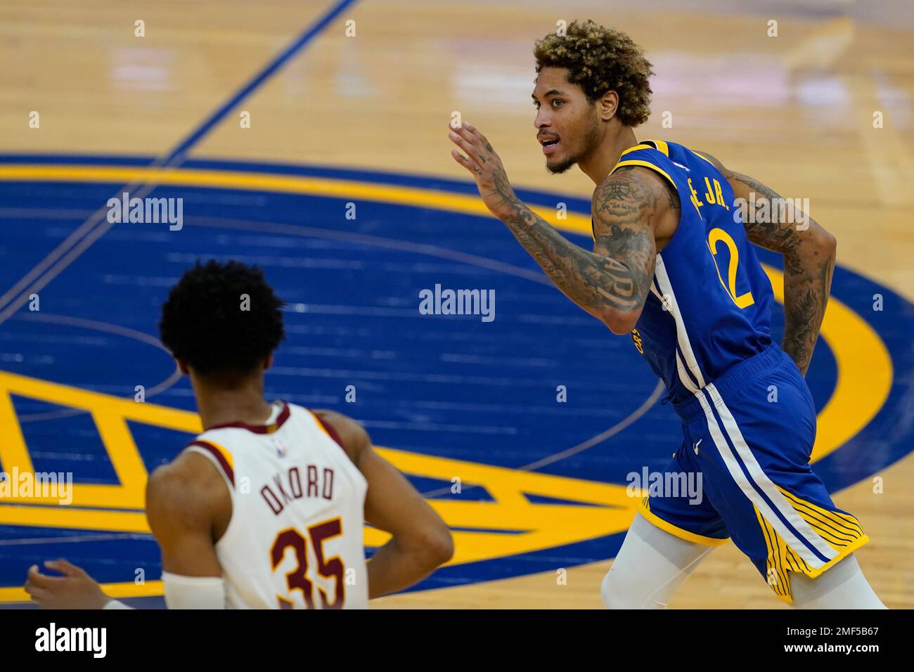 Golden State Warriors guard Kelly Oubre Jr., right, gestures toward ...