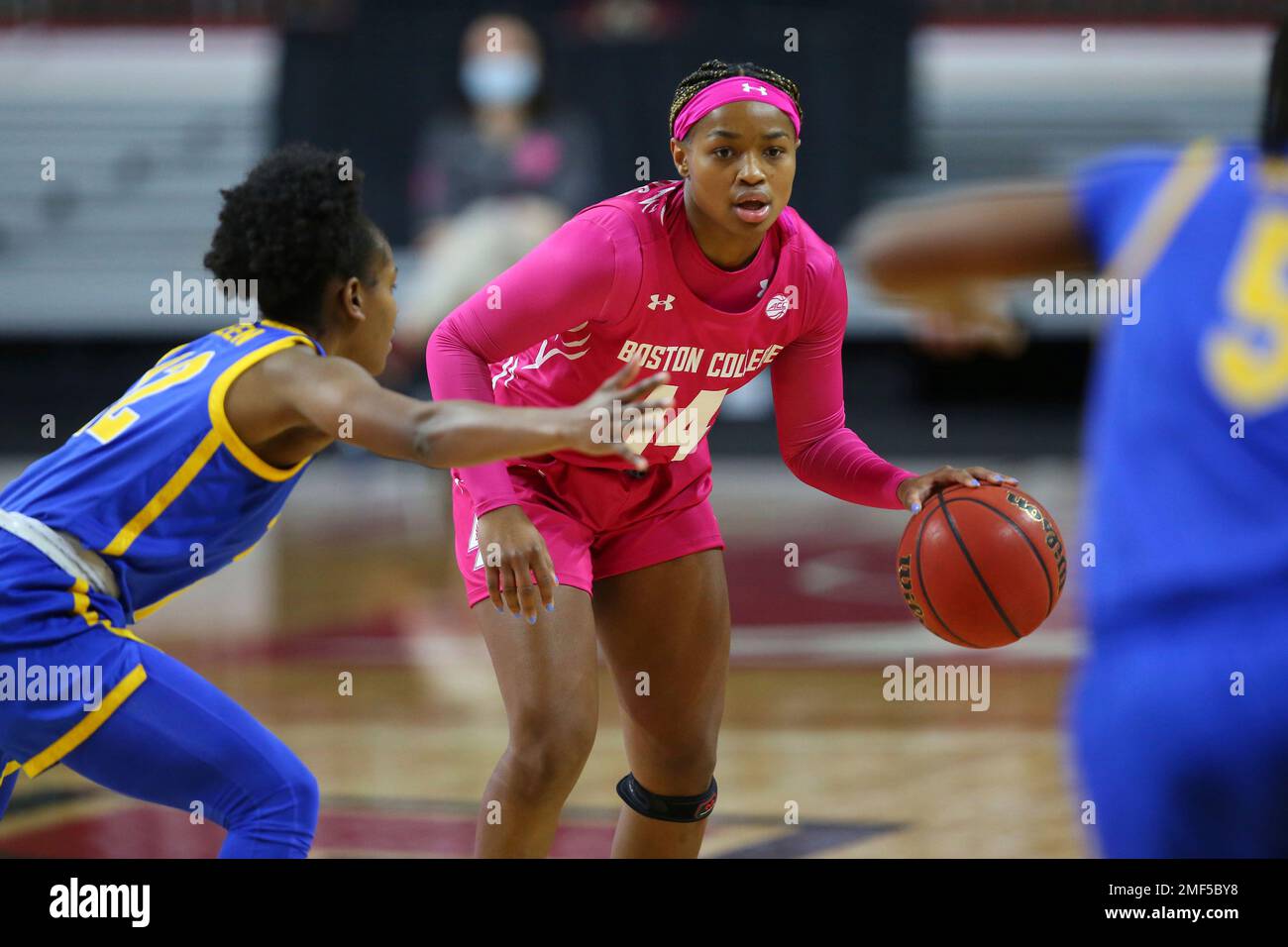 Boston College's Marnelle Garraud (14) is defended by Pittsburgh's ...