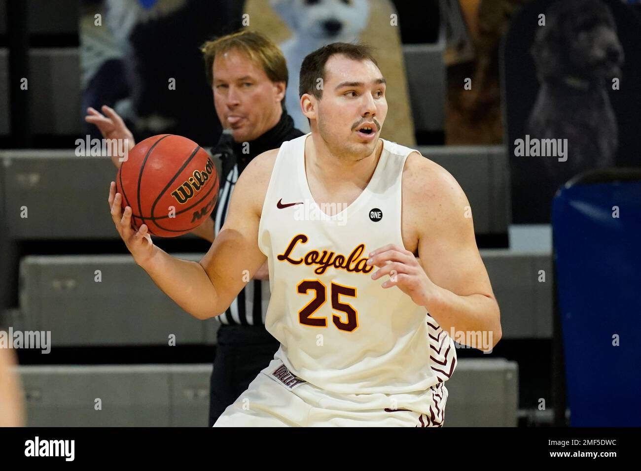 Loyola of Chicago center Cameron Krutwig looks to pass during the first ...