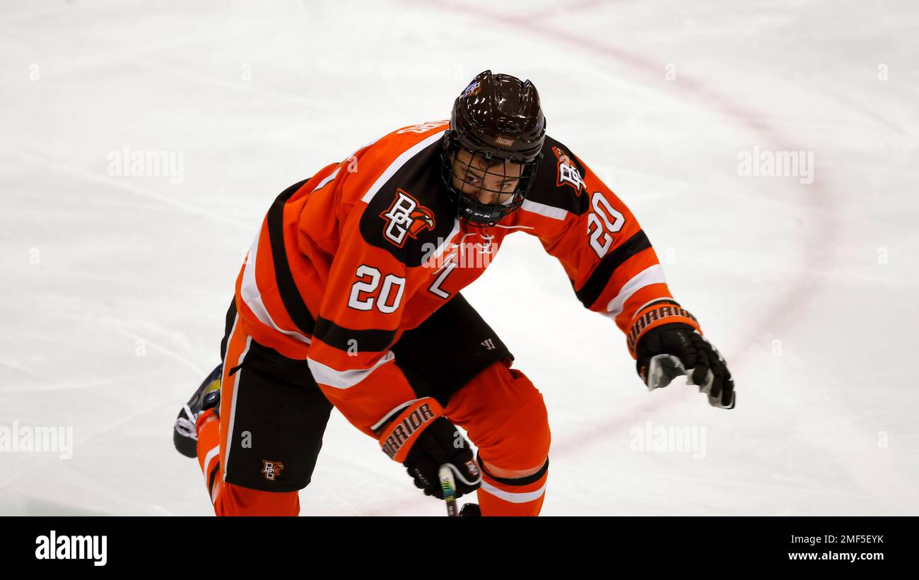 Bowling Green Falcons forward Connor Ford (20) skates after the puck ...