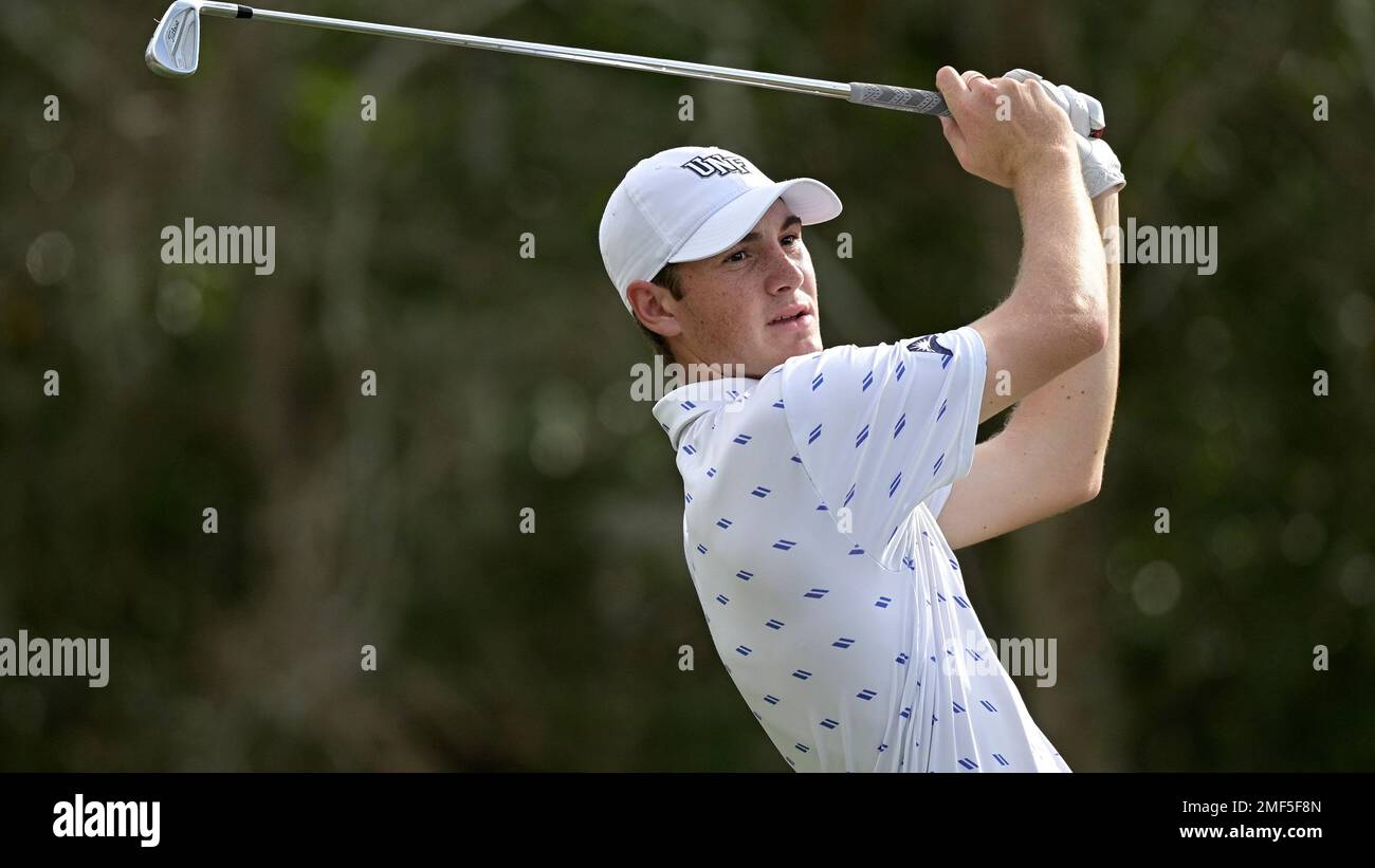 Nicholas Gabrelcik, of North Florida, watches his tee shot on the ...