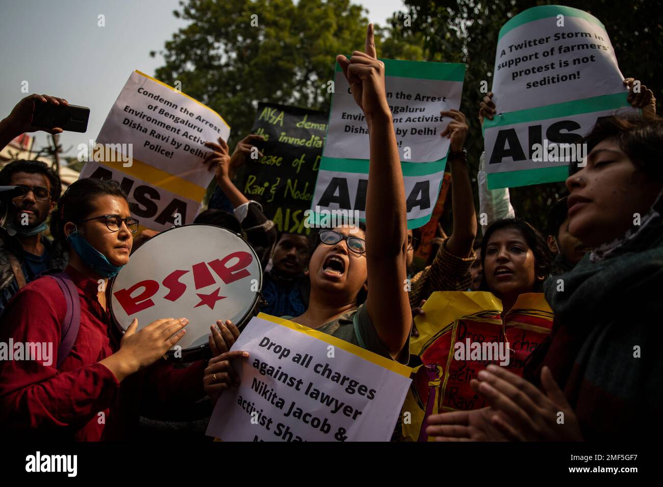Indian students hold placards and shout slogans condemning police ...