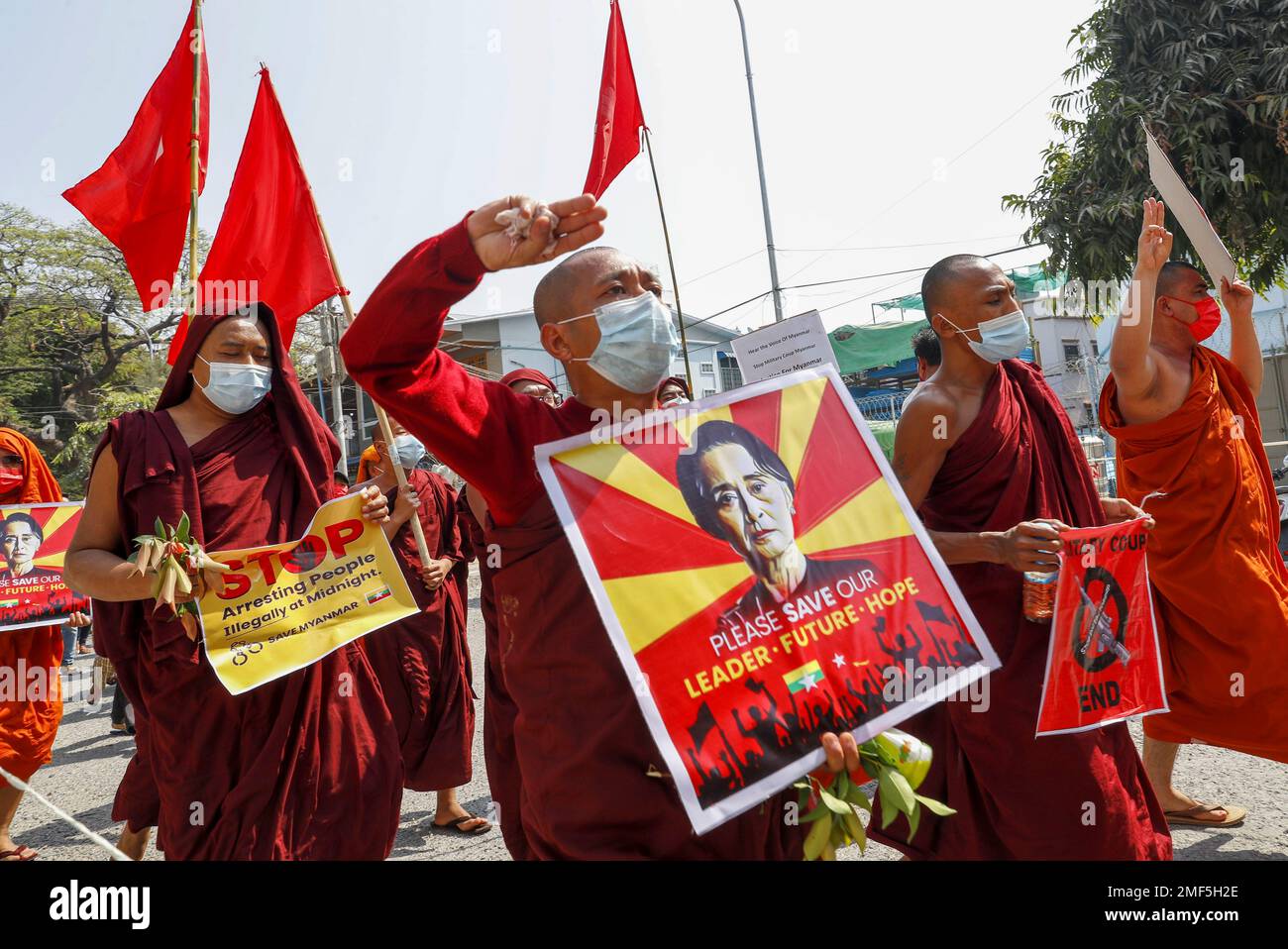 Buddhist monks and nuns display pictures of detained Myanmar leader ...