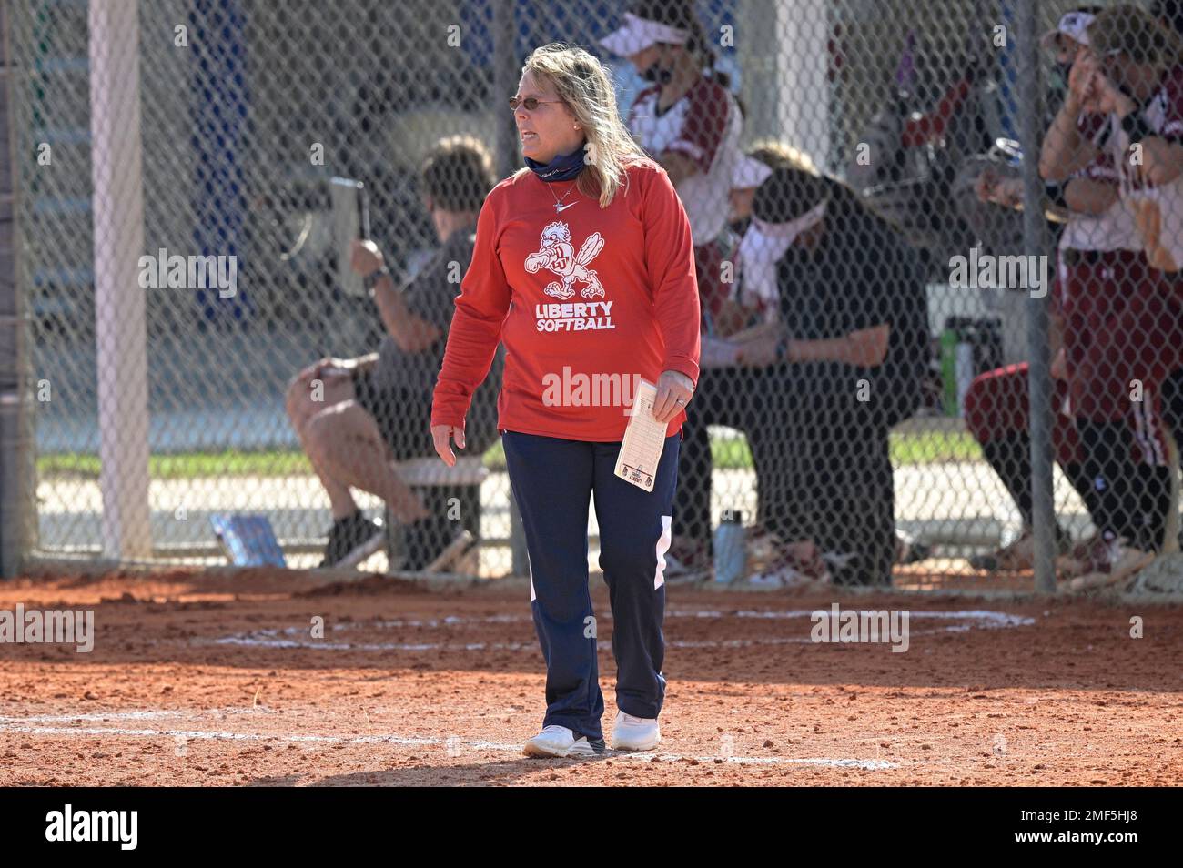 Liberty manager Dot Richardson calls out instructions during an NCAA ...