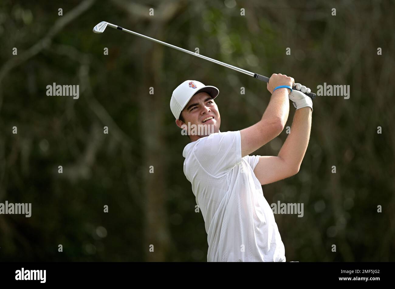 Tyler Wilkes, of Florida, watches his tee shot on the eighth hole ...