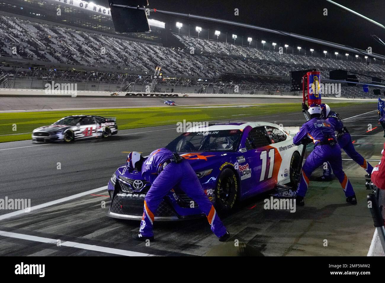 Denny Hamlin makes a pit stop during the NASCAR Daytona 500 auto race ...