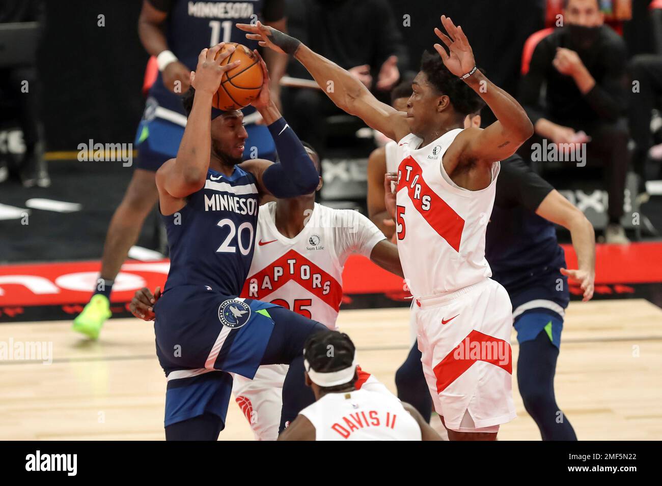 Toronto Raptors' Stanley Johnson (5) blocks a shot by Minnesota ...