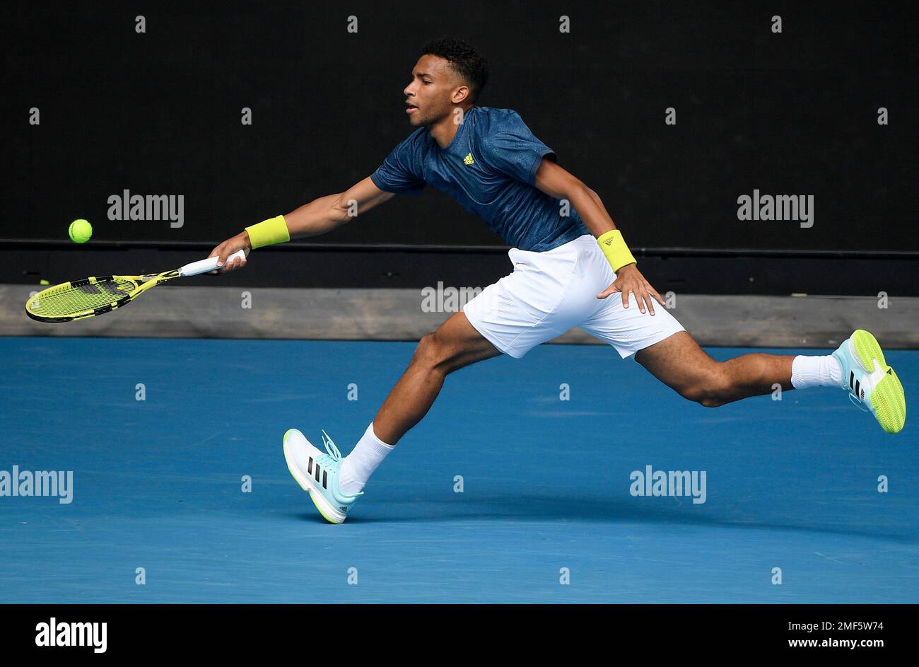 Canada's Felix Auger-Aliassime hits a forehand to Russia's Aslan ...