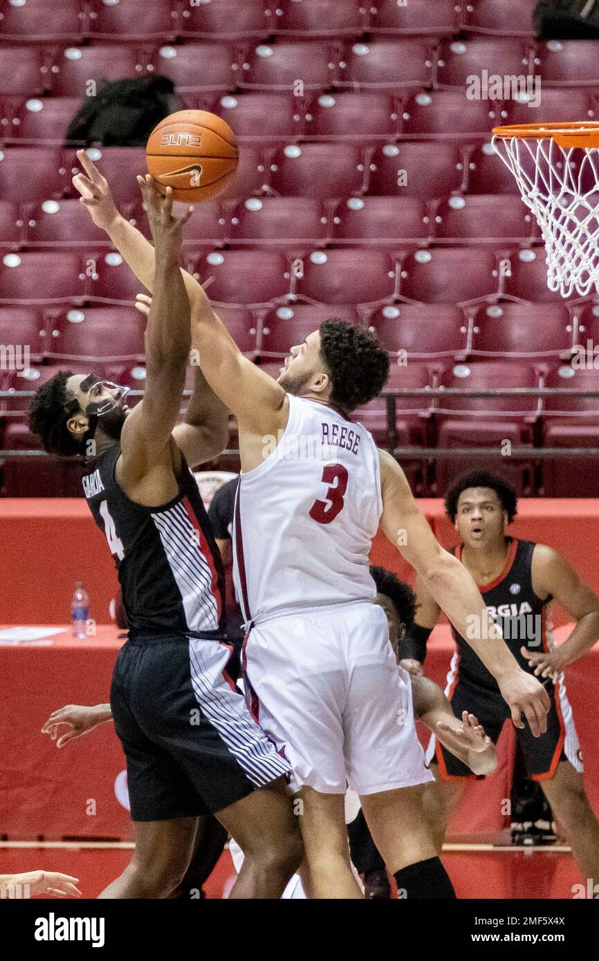 Alabama forward Alex Reese (3) defends a shot from Georgia forward ...