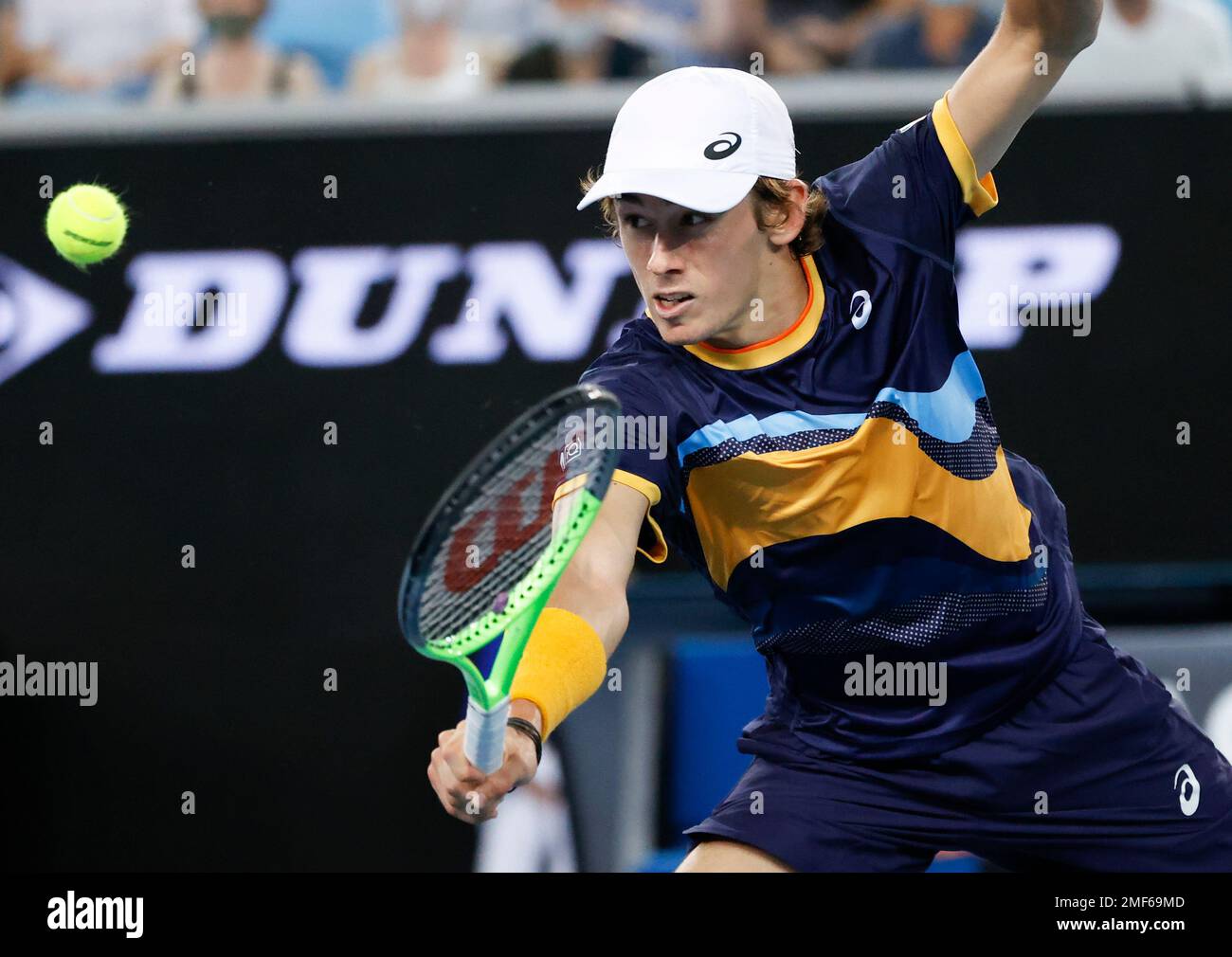 Australia's Alex De Minaur makes a backhand return to Uruguay's Pablo ...