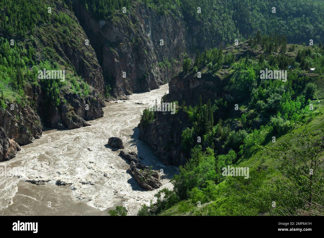 Class 5 rapids in the Grand Canyon of Stikine river near Telegraph ...