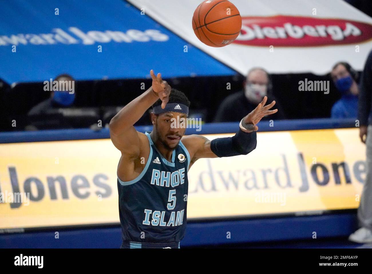 Rhode Island's Antwan Walker passes during the first half of an NCAA ...