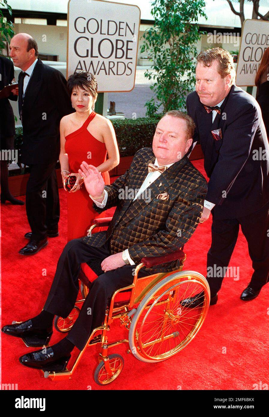 FILE - "Hustler" magazine publisher Larry Flynt arrives in a wheelchair ...