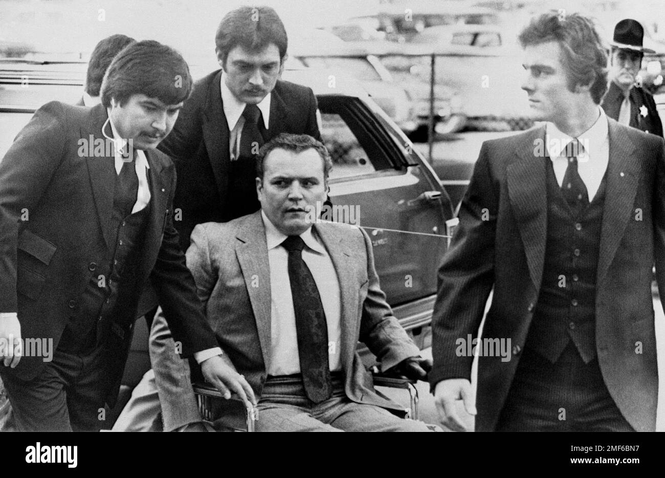 FILE - "Hustler" magazine publisher Larry Flynt is surrounded by heavy ...