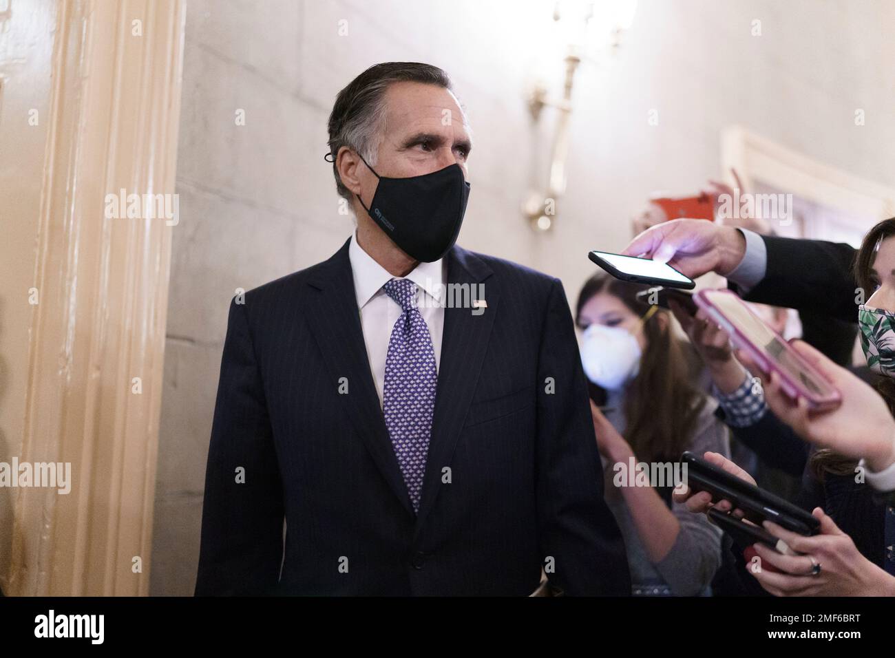 Reporters vie for a response from Sen. Mitt Romney, R-Utah, as Senators ...