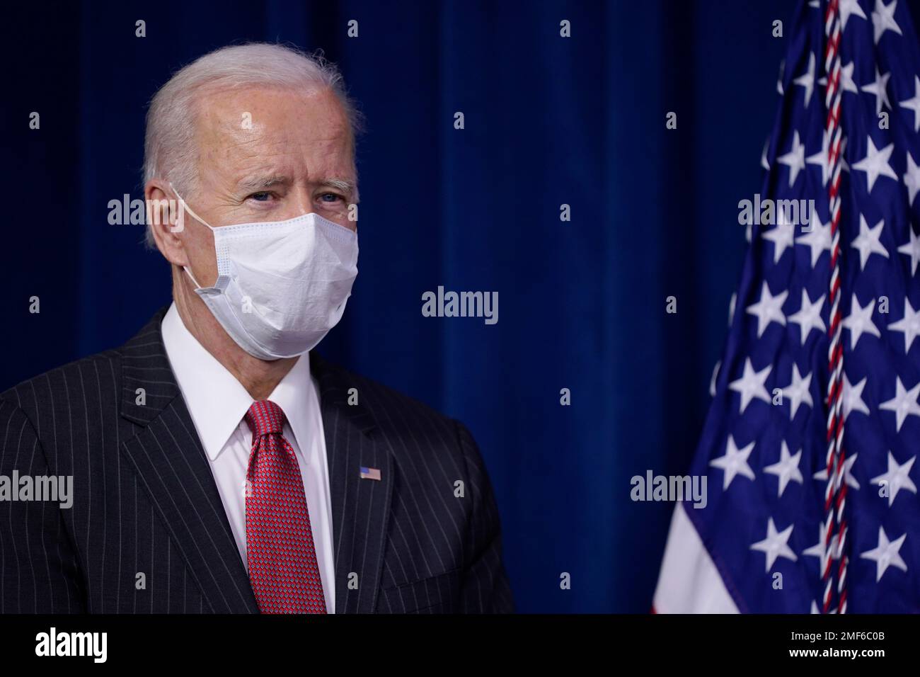 President Joe Biden waits to speak to Department of Defense personnel ...