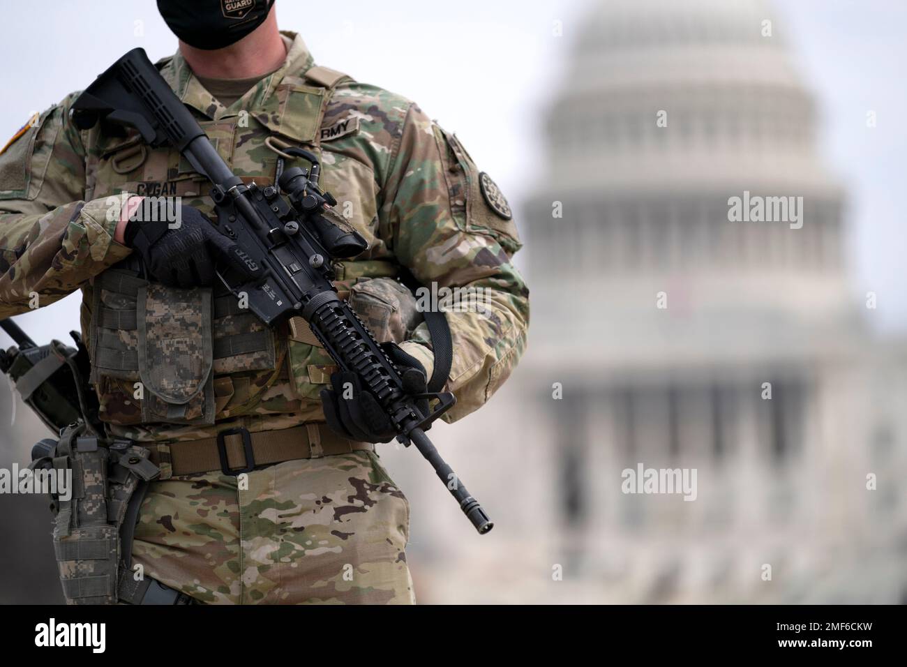 Members of the national guard patrol the area outside of the U.S ...