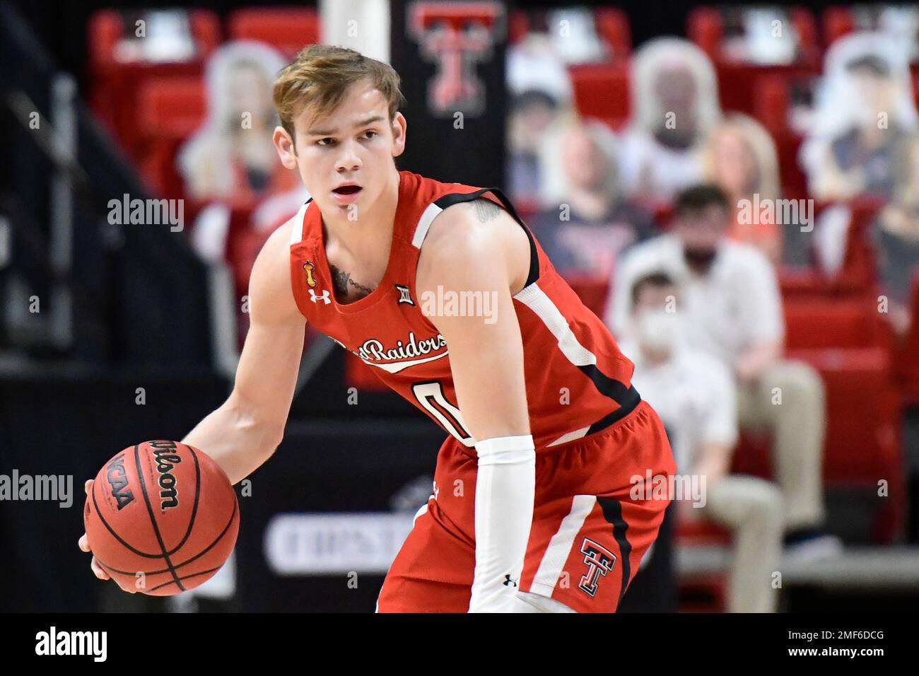 Texas Tech's Mac McClung (0) controls the ball during the first half of ...