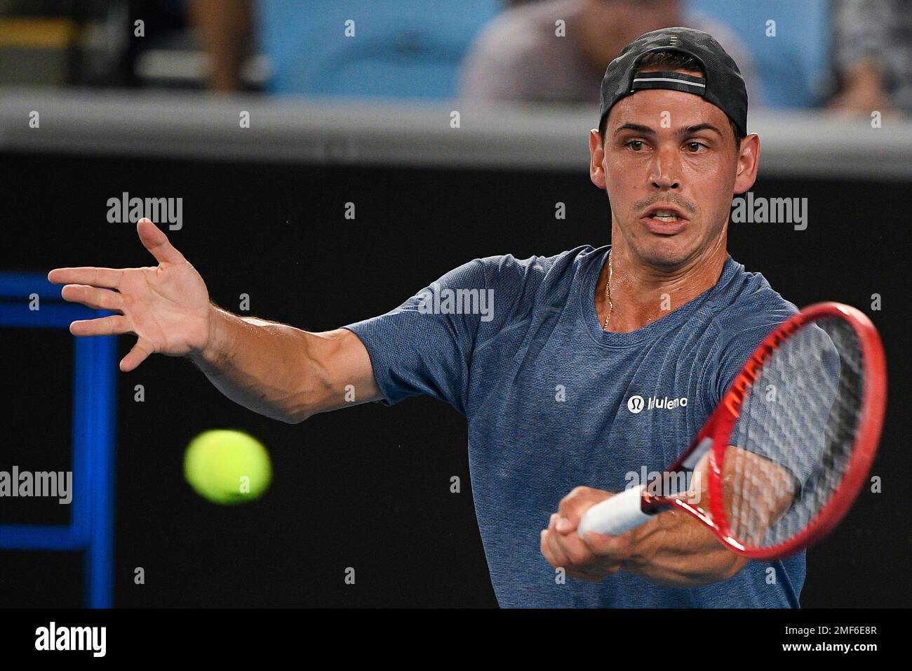 Australia's Alex Bolt akes a backhand return to Buglaria's Grigor ...