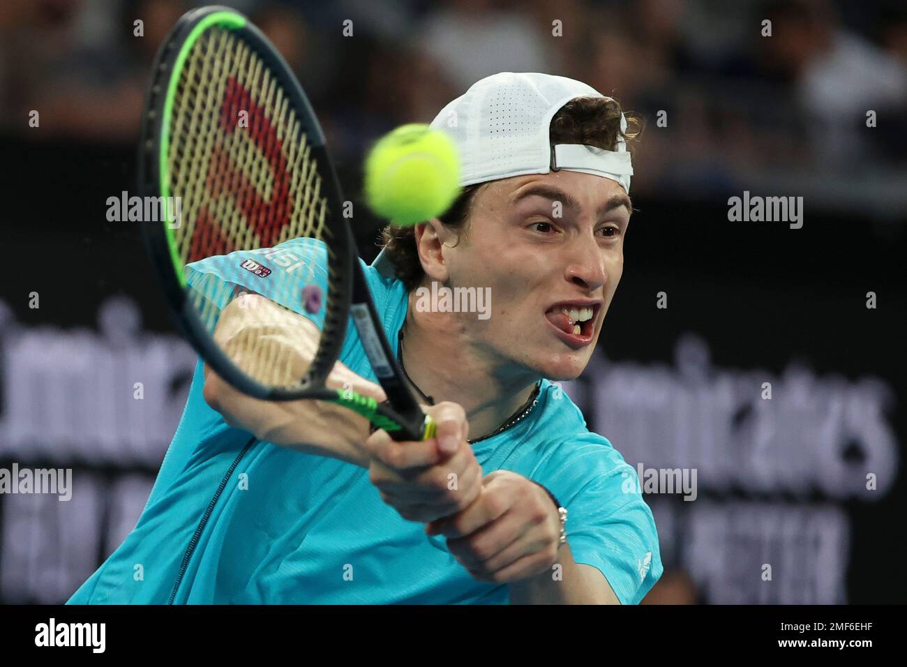 France's Ugo Humbert makes a backhand return to Australia's Nick ...