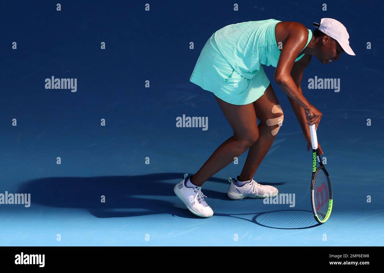 United States' Venus Williams reacts as she injures her leg during her ...