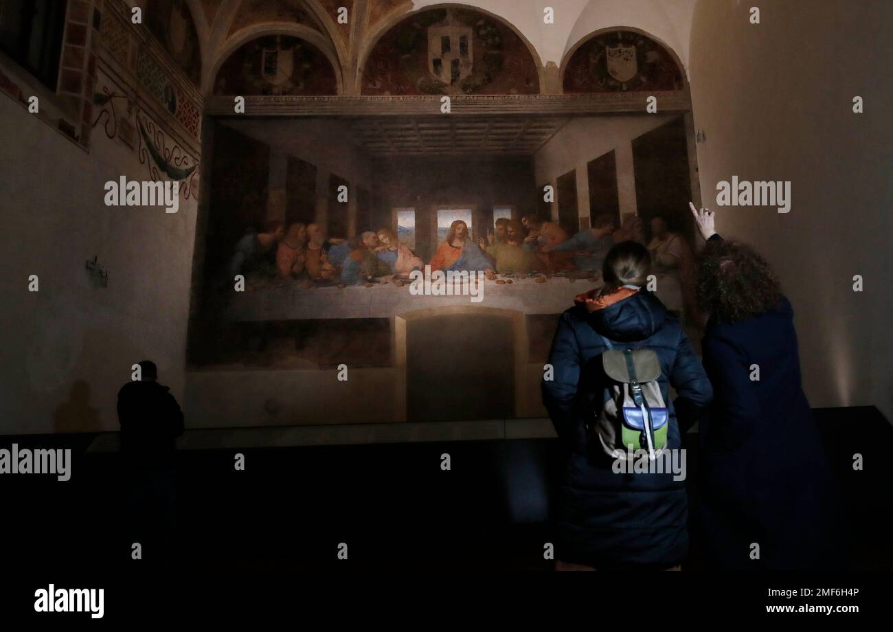 Visitors admire Leonardo da Vinci's painting "Last Supper," dating to ...