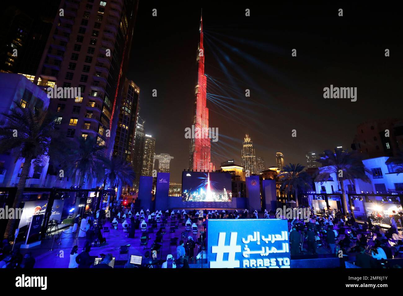The world tallest tower, Burj Khalifa is lit up with a laser show to ...