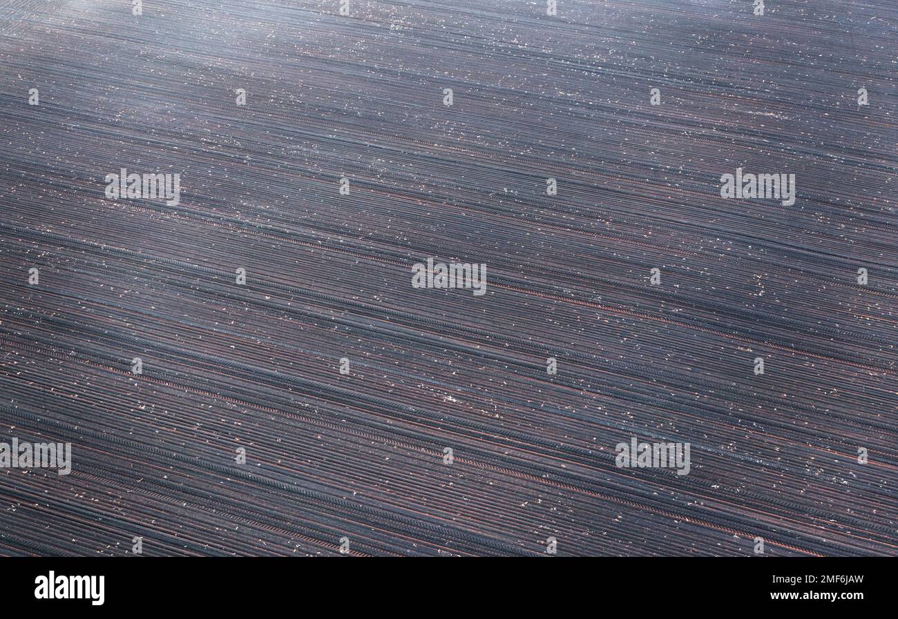 Aerial view of high quality soil in the field. Ready to grow crops ...