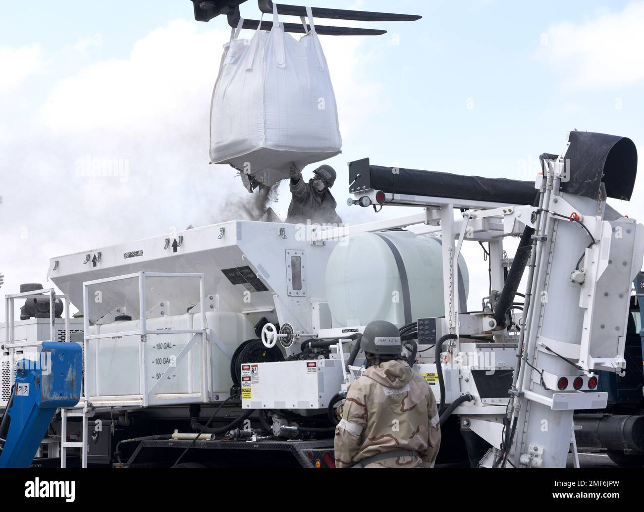 U.S. Air Force Airman 1st Class Jahsiah Keating, on top of vehicle ...