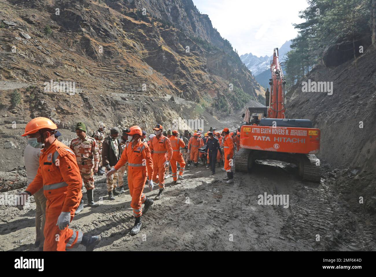 National Disaster Response Force (NDRF) personnel clear debris after a ...