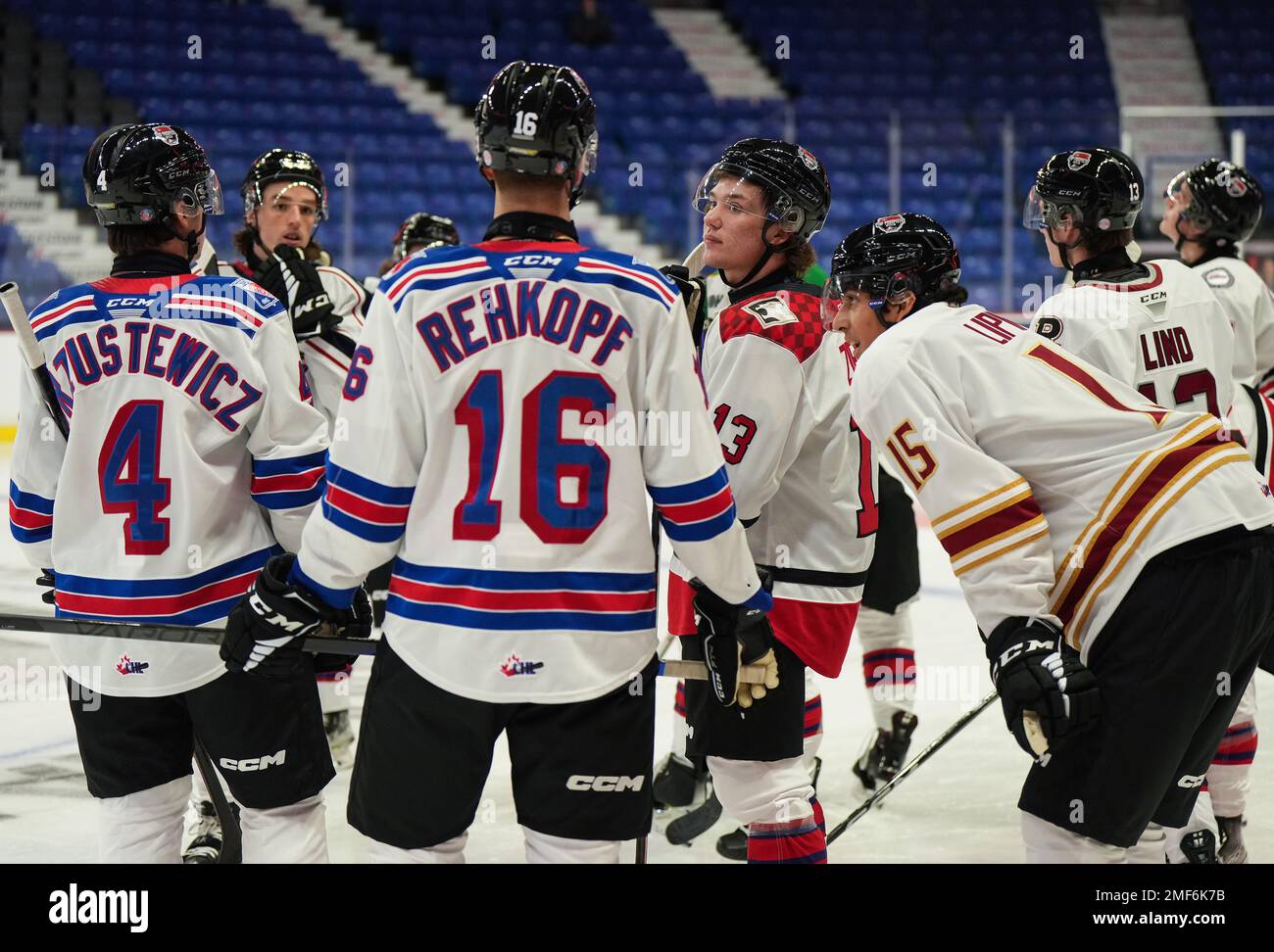 Prince George Cougars' Koehn Ziemmer (13) and Vancouver Giants' Jaden ...