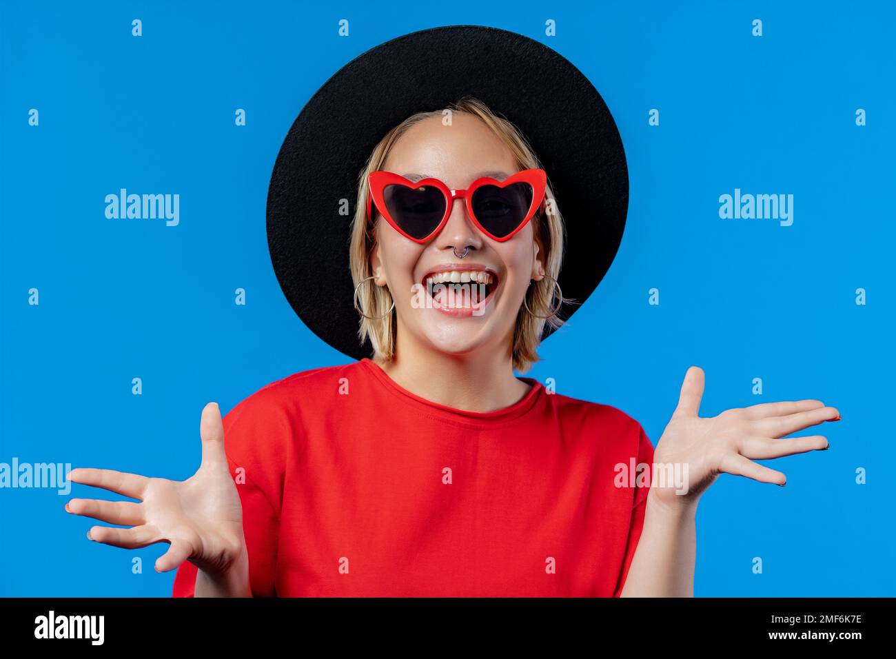 Amazed woman, she expresses WOW. Impressed teenager trying to get ...