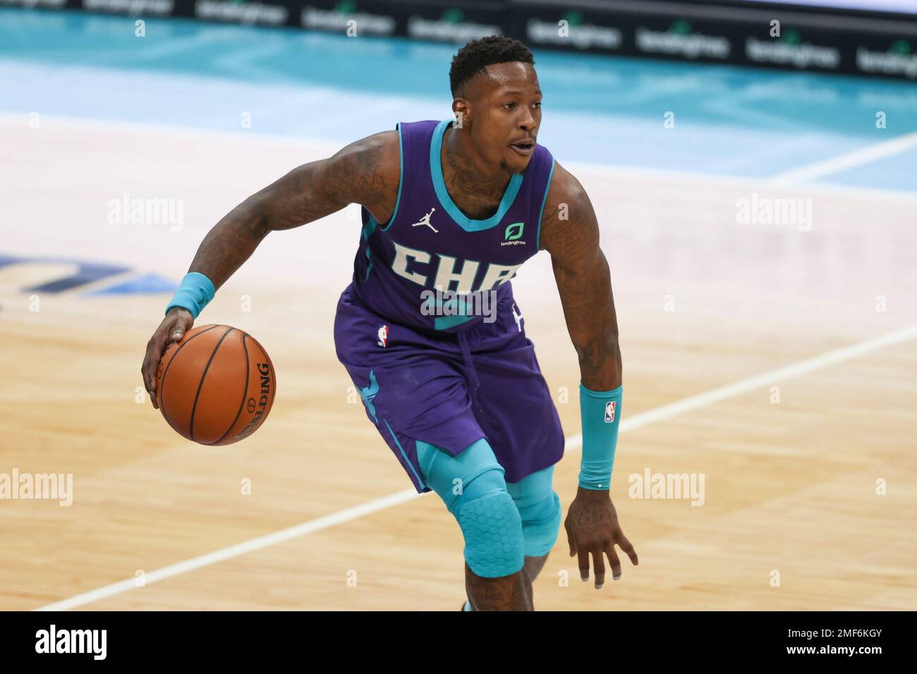 Charlotte Hornets guard Terry Rozier brings the ball up court against ...