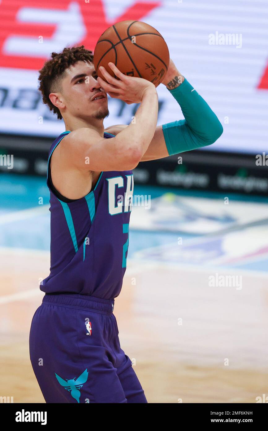 Charlotte Hornets guard LaMelo Ball shoots against the Houston Rockets ...