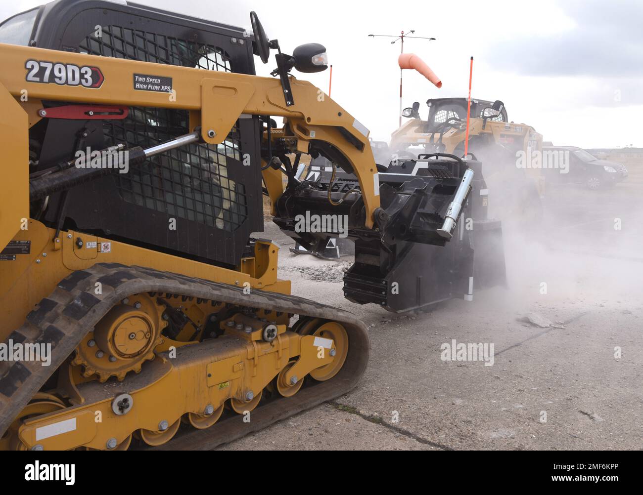 Two compact track loaders are used by Airmen from the 100th Civil ...