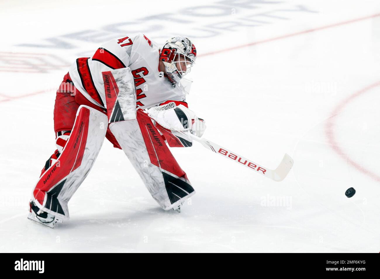 Carolina Hurricanes goalie James Reimer clears the puck against the ...