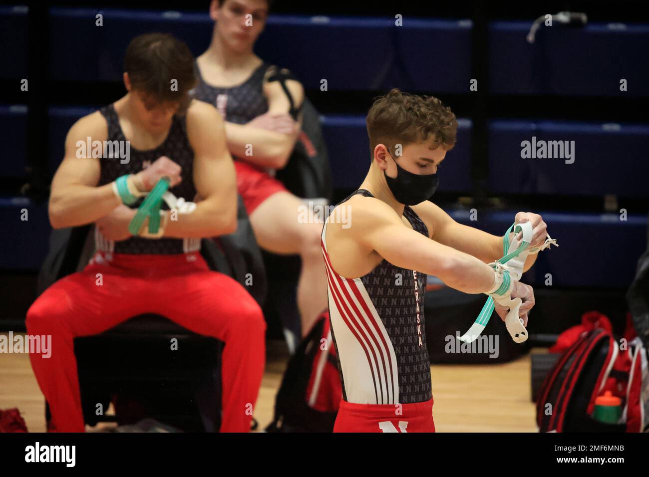 Nebraska's Moritz Mueller wraps his wrists before competing on the ...
