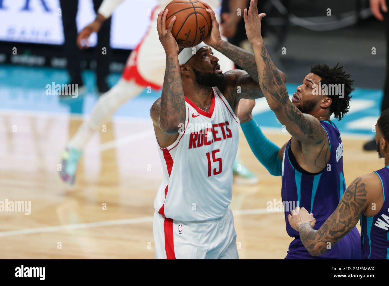 Houston Rockets center DeMarcus Cousins (15) shoots over Charlotte ...