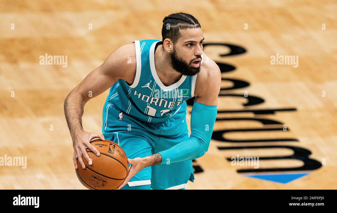 Charlotte Hornets forward Cody Martin (11) brings the ball up court ...