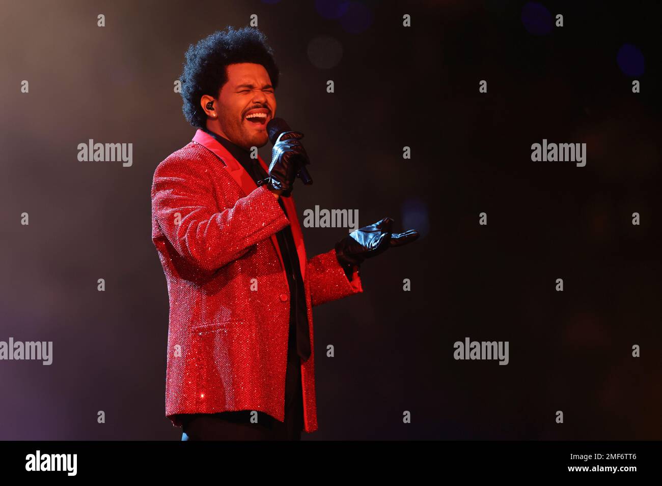 The Weeknd performs during halftime of the NFL Super Bowl 55 football ...