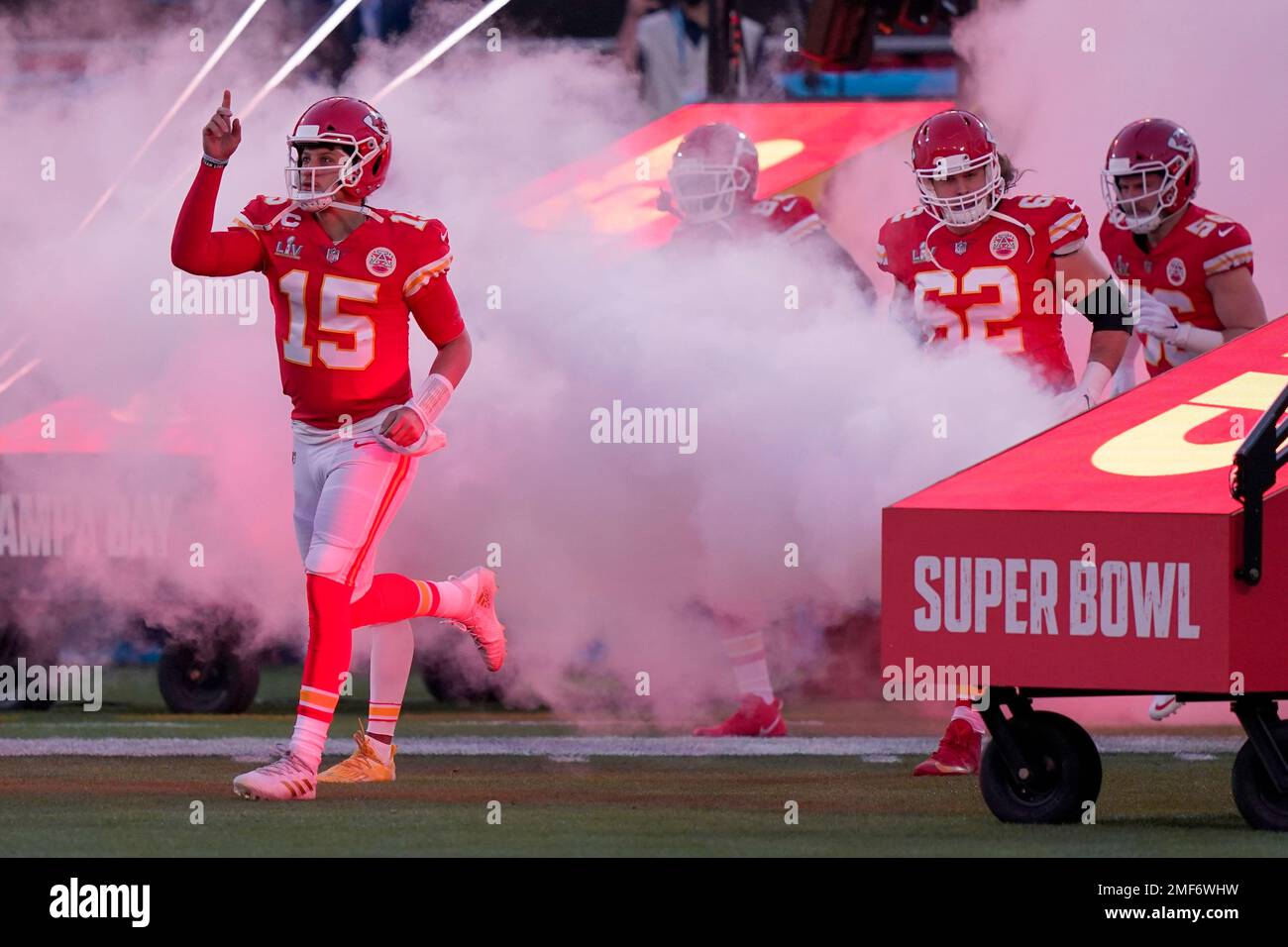 Kansas City Chiefs quarterback Patrick Mahomes runs onto the field ...