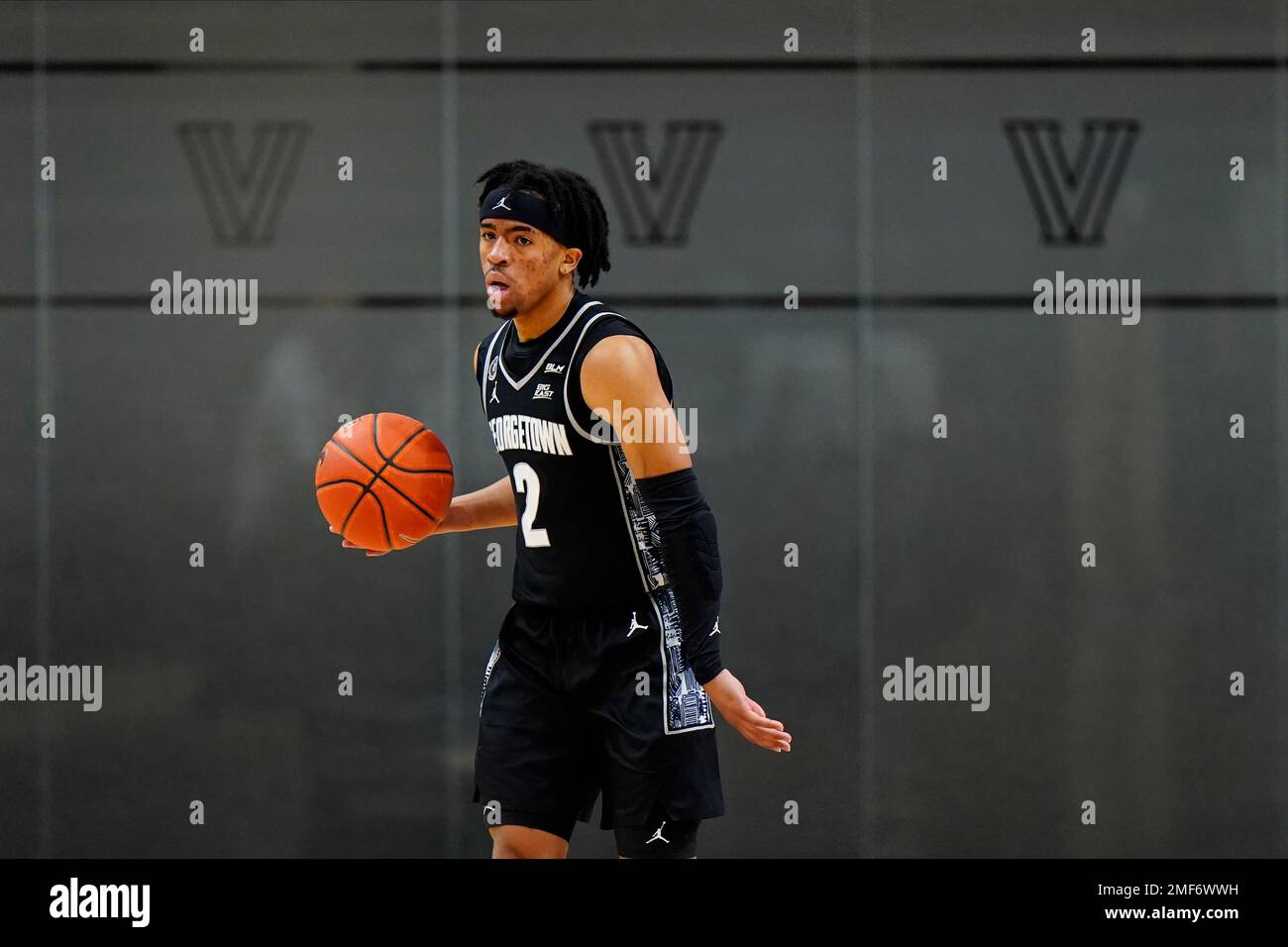 Georgetown's Dante Harris plays during an NCAA college basketball game ...