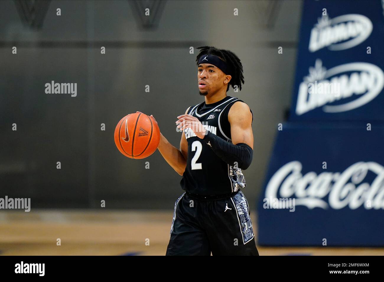 Georgetown's Dante Harris plays during an NCAA college basketball game ...