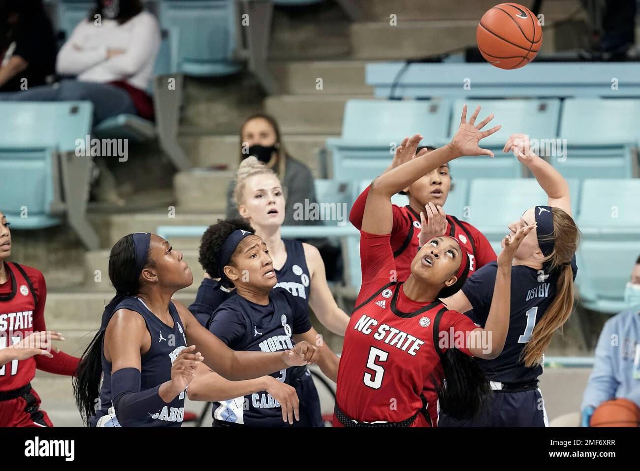 North Carolina State forward Jada Boyd (5) reaches for a rebound with ...